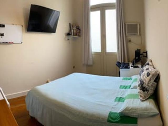 Quarto com varanda em casa colonial em Laranjeiras