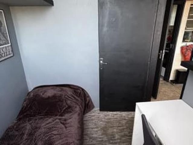 Quarto com vista extraordinária perto da Av. Paulista