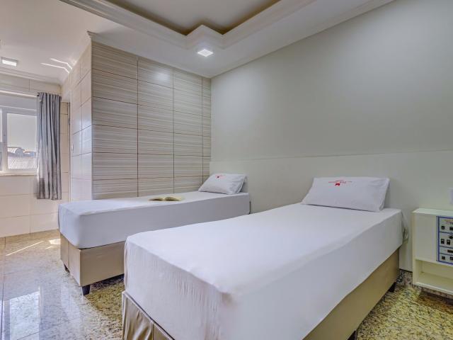 QUARTO COM 2 CAMAS DE SOLTEIRO