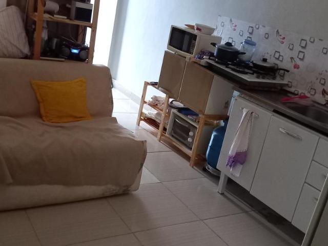 Quarto compartilhado em kitinet compartilhada