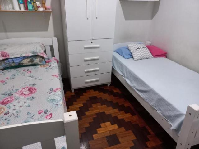 Quarto compartilhado para mocas