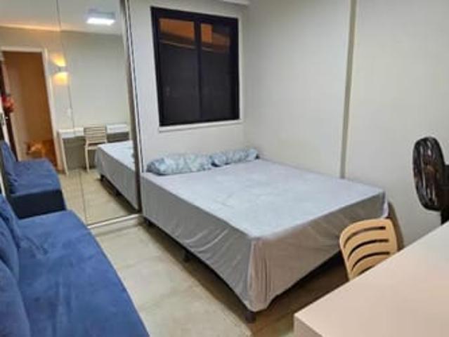 Quarto confortável em ambiente familiar e acolhedor
