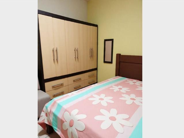 quarto amplo acomchegante