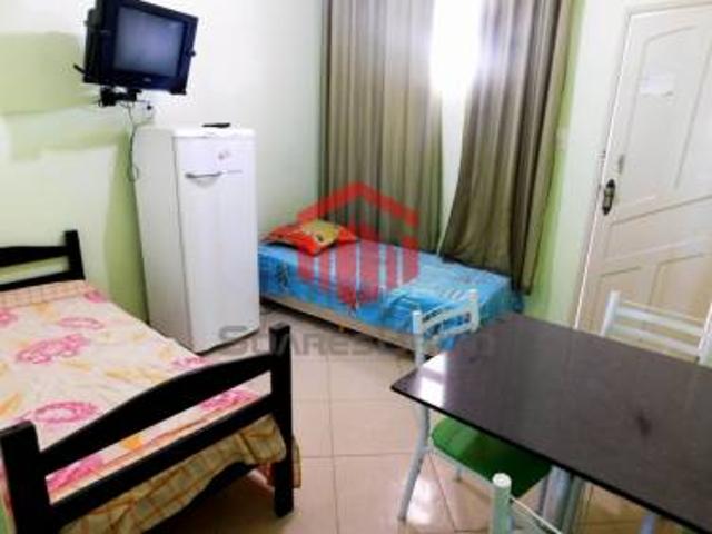 Quarto e Sala Com Vista Para o Mar
