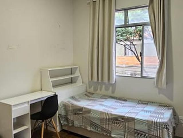 Quarto em apt charmoso na Savassi
