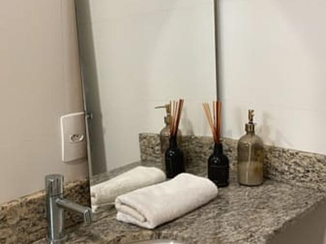 Quarto em geminado alto padrão