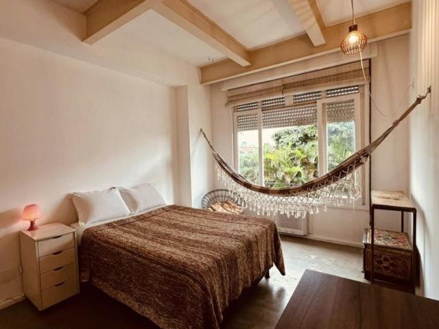 Quarto Vista Verde/Mar Be No Glória Coliving Residencial