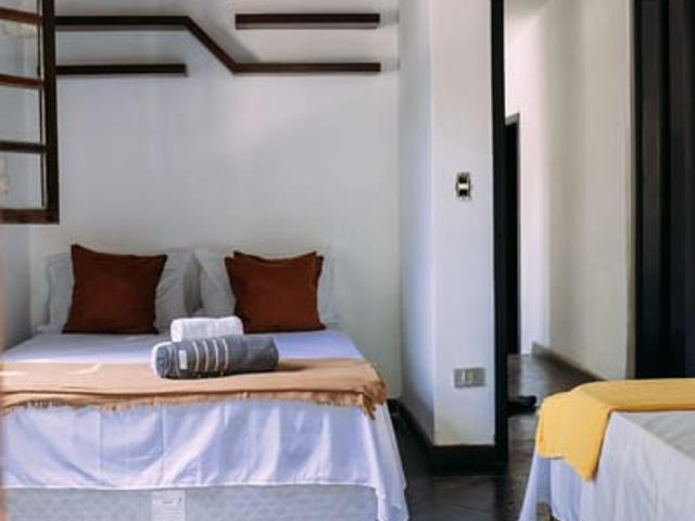 Quartos em casa compartilhada