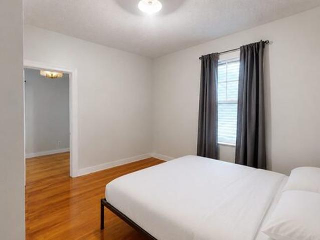 Queen bedroom in 4 bed/1 bath home in Dorchester Center #568 D
