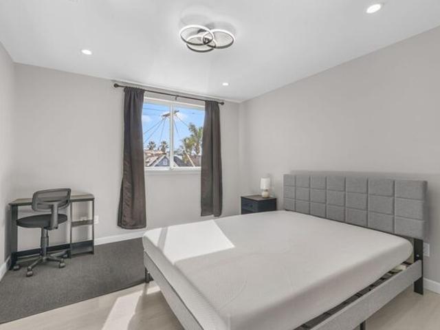 Queen bedroom in 5 bed/5 bath home in Boyle Heights #1828 B