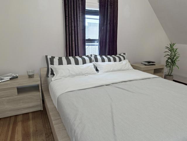 Queen bedroom in 6 bed/2 bath home in Brighton #375 3F