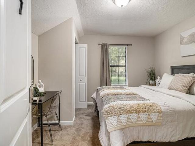 Quiet, Clean, and Affordable Living in Lithonia GA! Essential Furnishings Black Out Curtains On Site Laundry Desk & Chair in Every Room! Fully Stocked Kitchen with Cookware 40” Smart TV with Streaming Apps in Every Room!