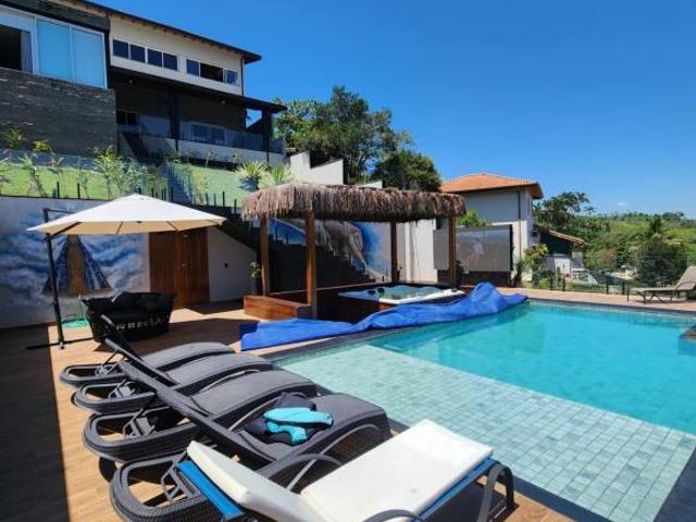 R CASA NA REPRESA EM CONDOMINIO FECHADO EM IGARATA