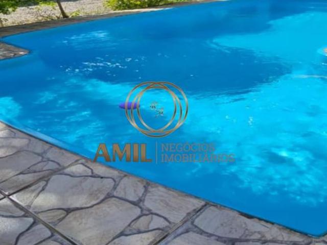 RA AMIL Vende, Casa térrea, piscina, esquina, 02 dormitórios, 126m², Bairro Ipiranguinha Caraguata