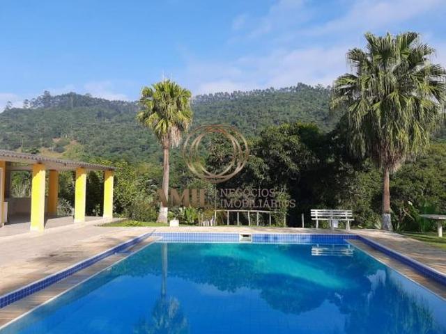 RA AMIL VENDE SITIO 16MIL M² COM RIO NOS FUNDOS, RUA SEM SAIDA, 2 PISCINAS, CAMPO FUTEBOL, POMAR, SA