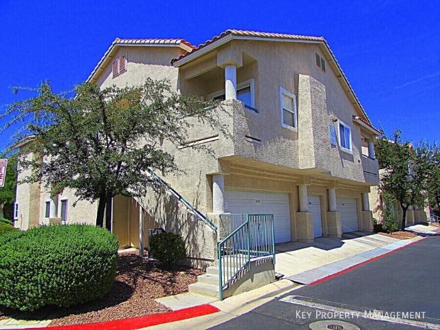 Remodeled 2nd Floor Condo with Vaulted Ceilings & Garage in Gated Community