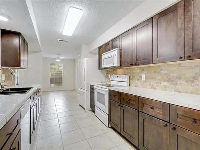 Really cool townhouse with rooms for available for rent. East riverside/Oltorf area. 2 bed. 2.5bath 2 car garage to protect your car from hail.