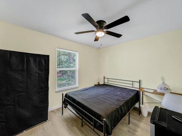 Recently renovated Fort Worth house featuring personal mini fridges per room, 50 TVS, and all the amenities you need!