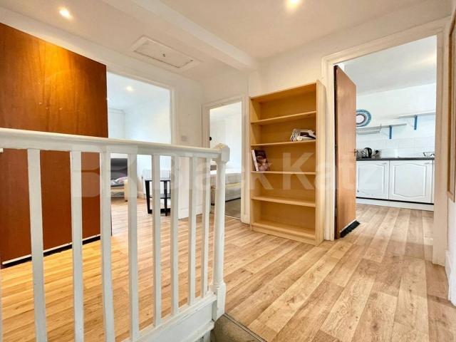 recently redecorated three double bedroomed apartment is set on the second floo