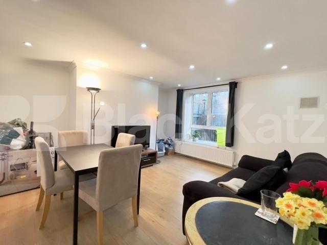 Recently redecorated throughout, wooden floors, white walls & superbly located