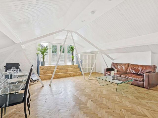 Recently refurbished two bedroom loft apartment with private terrace