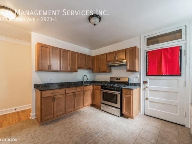Rehabbed 2bed in Belmont and Cragin New SS Appliances Heat included, Laundry in Building