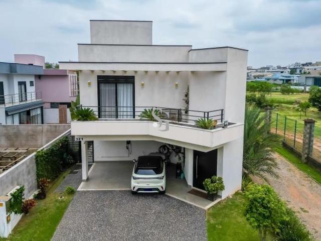 Residência de Luxo no Swiss Park: Sobrado de 4 suítes, lazer completo e pôr do sol deslumbrante!