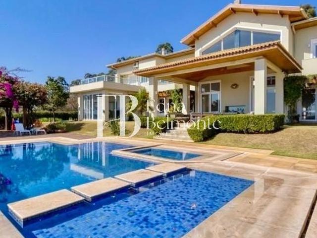 Residência Exclusiva com 6 Suítes em Terreno de 3.000 m² no condomínio Fazenda da Grama com Acesso a