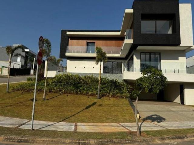 Residência em condomínio no Green Valley: 4 quartos, 4 suítes, 3 salas, 6 banheiros e 480m² Votora