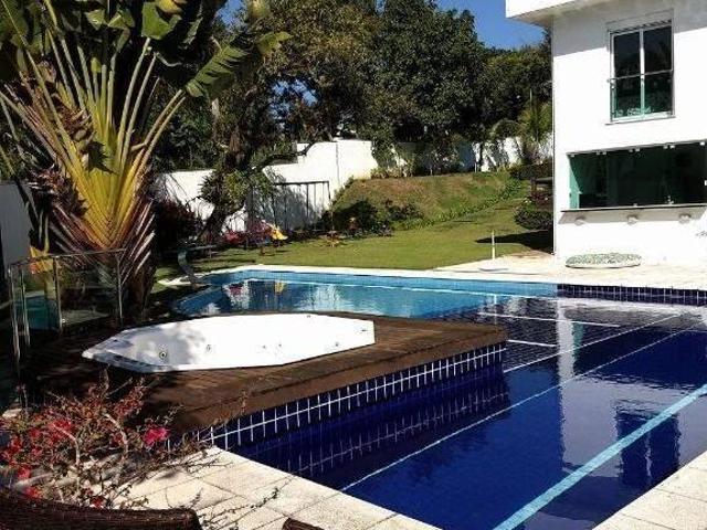 Residência Impecável com 5 Suítes e Área de Lazer Completa – 500m²