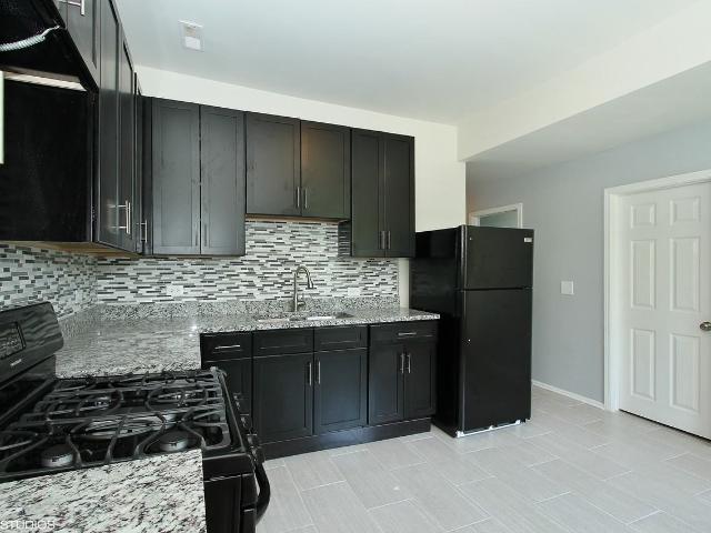 RHODES_6422 4 Bedroom Apartment for Rent at 6422 S Rhodes Ave, Chicago, IL 60637 Woodlawn