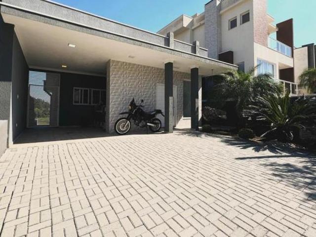 RO CASA EM CONDOMINIO ARUÃ 3 SUITES