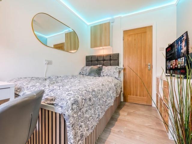 Room at Caxton Road, Manchester