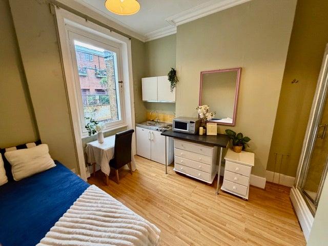 Room at Lena Gardens, Greater London