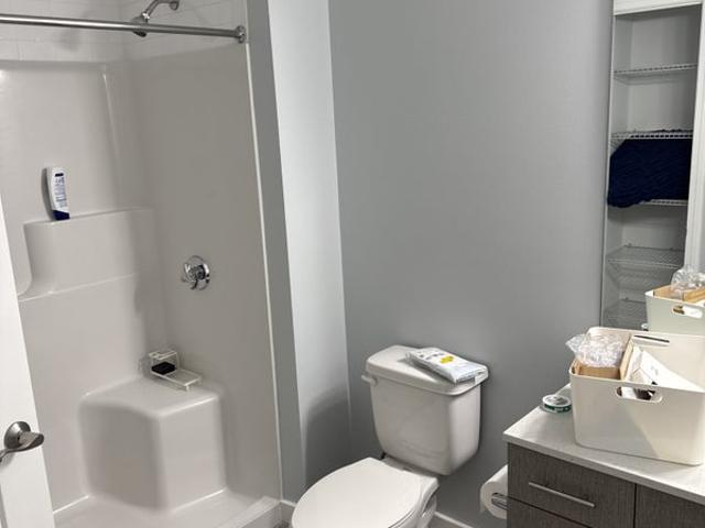 Room and en suite bathroom at Gilbert Crossing
