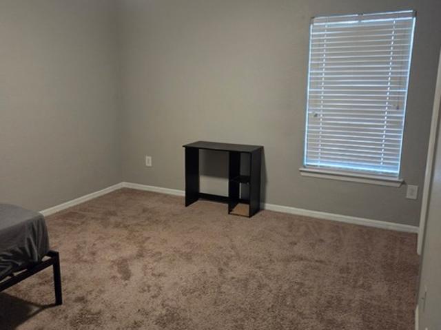Room and private bathroom in gated community