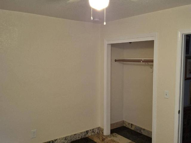 room with granite/marble floors