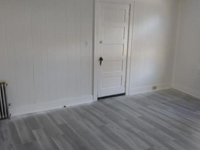 Room with shared bathroom