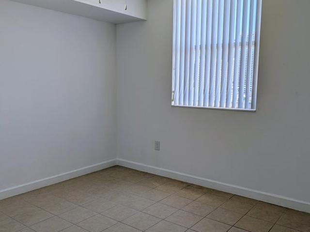 Room with private bathroom at Island Living Bldg