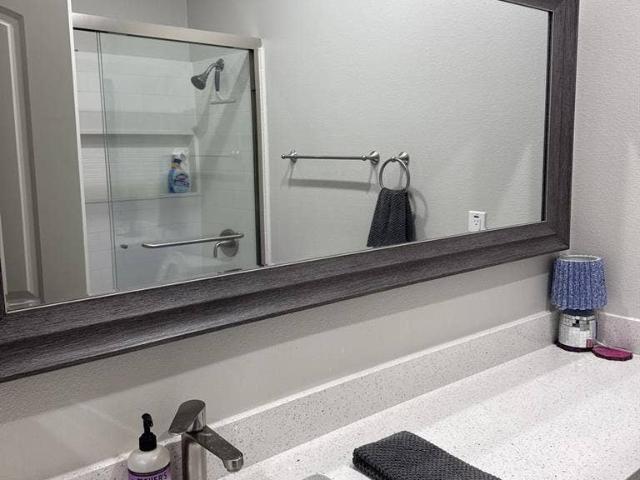 Room with private detached bathroom