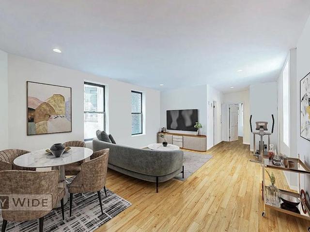 Roommate for m huge 2 bed apt + den