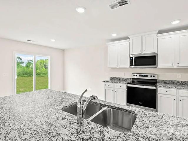 Rooms available in beautiful 3 bedroom Charlotte home.