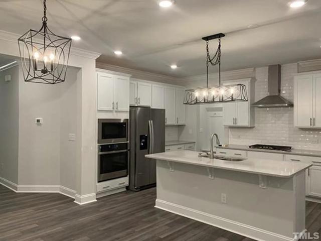 Rooms available in new two story townhome. Design is casual but elegant. The main level hosts a great room that melds seamlessly in an open concept layout with a modern kitchen and lovely dining room. A covered porch enhances outdoor enjoyment.