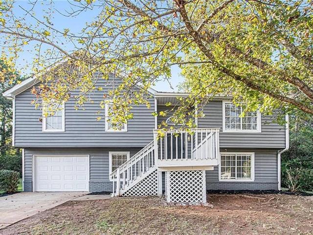 Rooms available in this captivating home in the enchanting Newberry Downs community. This pristinely renovated, fve bedroom, two bath masterpiece offers over two thousand square feet of upgrades.