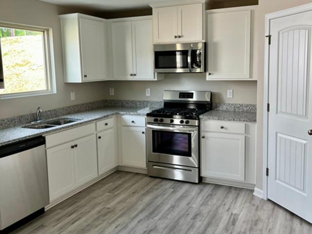 Rooms available in this newly built home. This home offers 4 bedrooms and 3 baths and is quite spacious. Features an updated, modern kitchen.