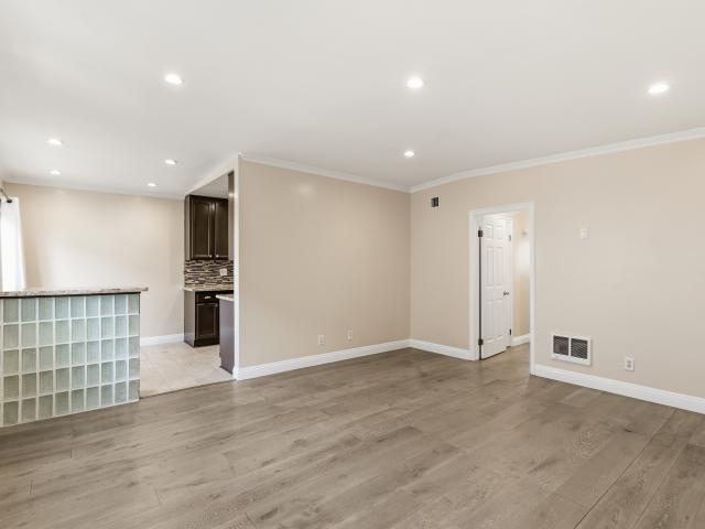 Roomy Top Floor Westchester Condo with Vaulted Ceilings and Storage for Days