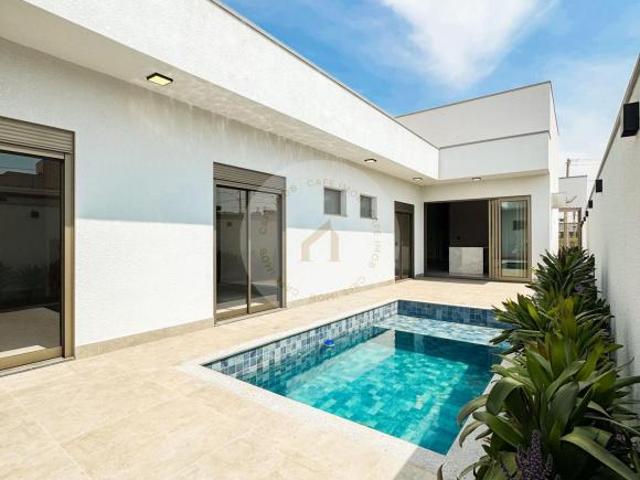 Santorini Residencial Club Casa de alto padrão com 3 suítes e acabamento primeira linha Condomín