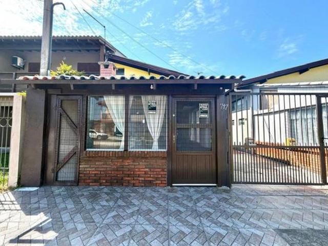 Sala comercial com apartamento