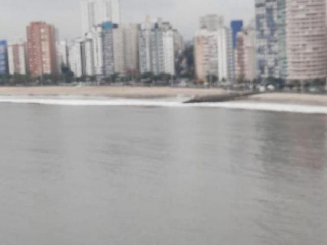 Sala living frente ao mar. Varanda e mobiliado São Vicente