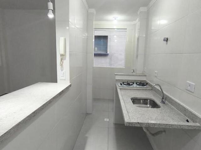 Sala living reformada na quadra da praia no Embaré em Santos